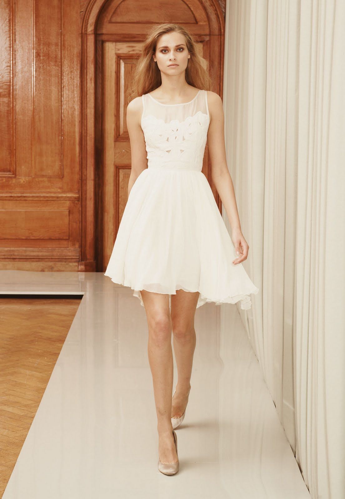 Kate Middleton wearing the Reiss Peacock dress