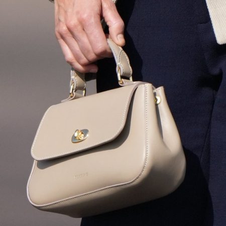 Kate Middleton carrying the Tusting Mini Holly Bag in Taupe